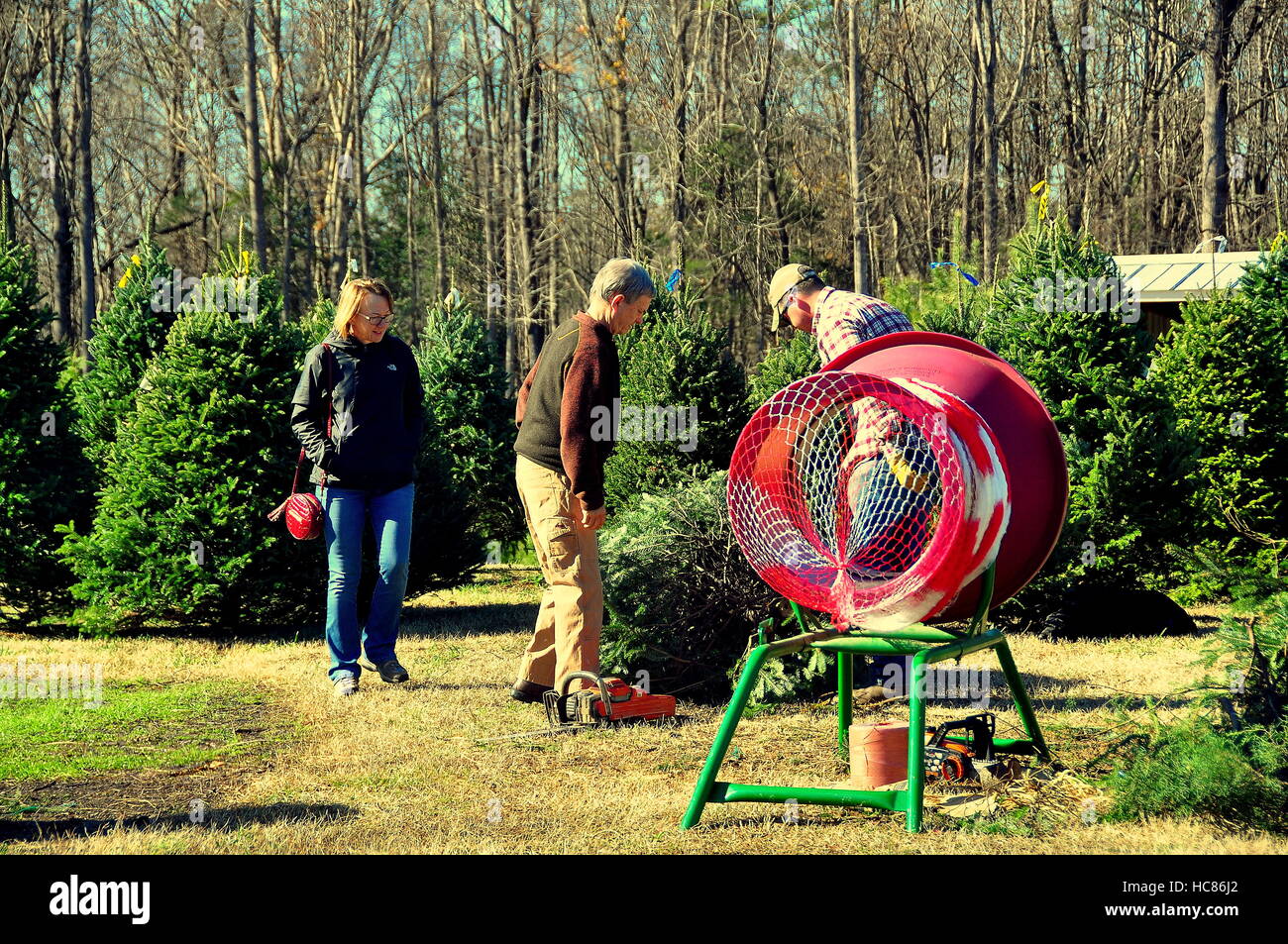 Pittsboro, North Carolina - December 7, 2016: Husband and wife buying a ...
