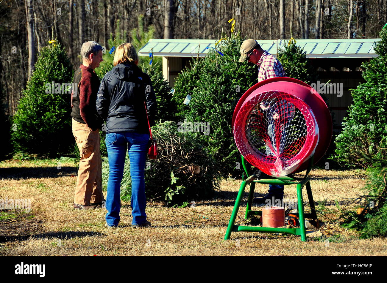 Pittsboro, North Carolina - December 7, 2016: Husband and wife buying a ...