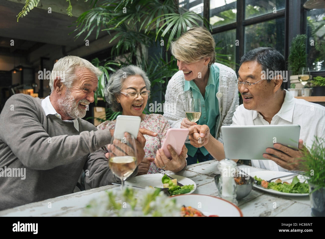 Group of Senior Retirement Meet up Happiness Concept Stock Photo - Alamy