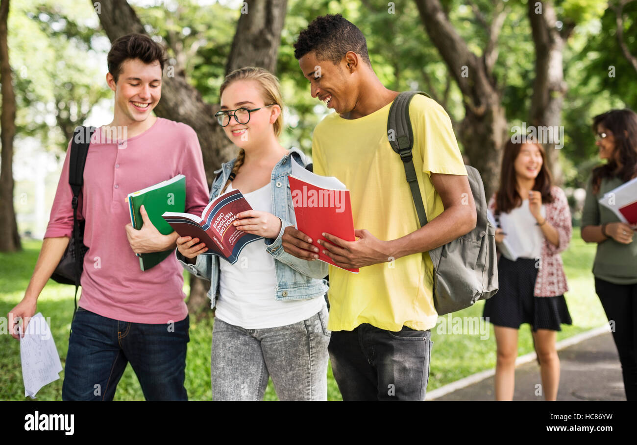 Diverse Young Students Book Outdoors Concept Stock Photo - Alamy