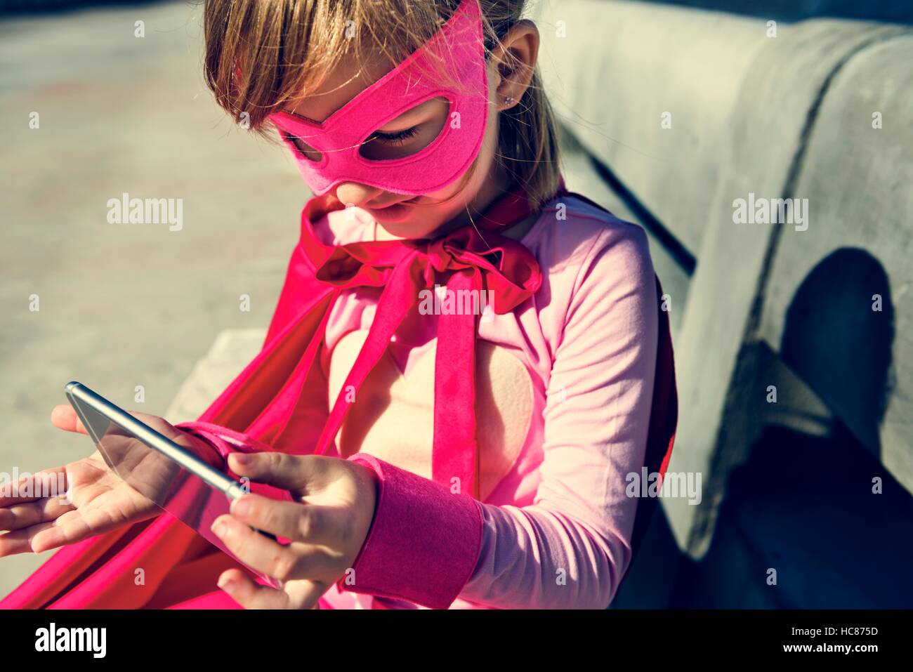 Little Girl Using Device Concept Stock Photo - Alamy