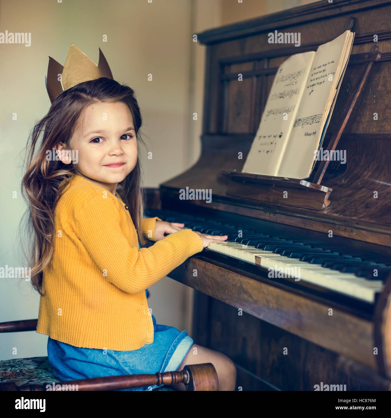 Adorable Cute Girl Playing Piano Concept Stock Photo - Alamy