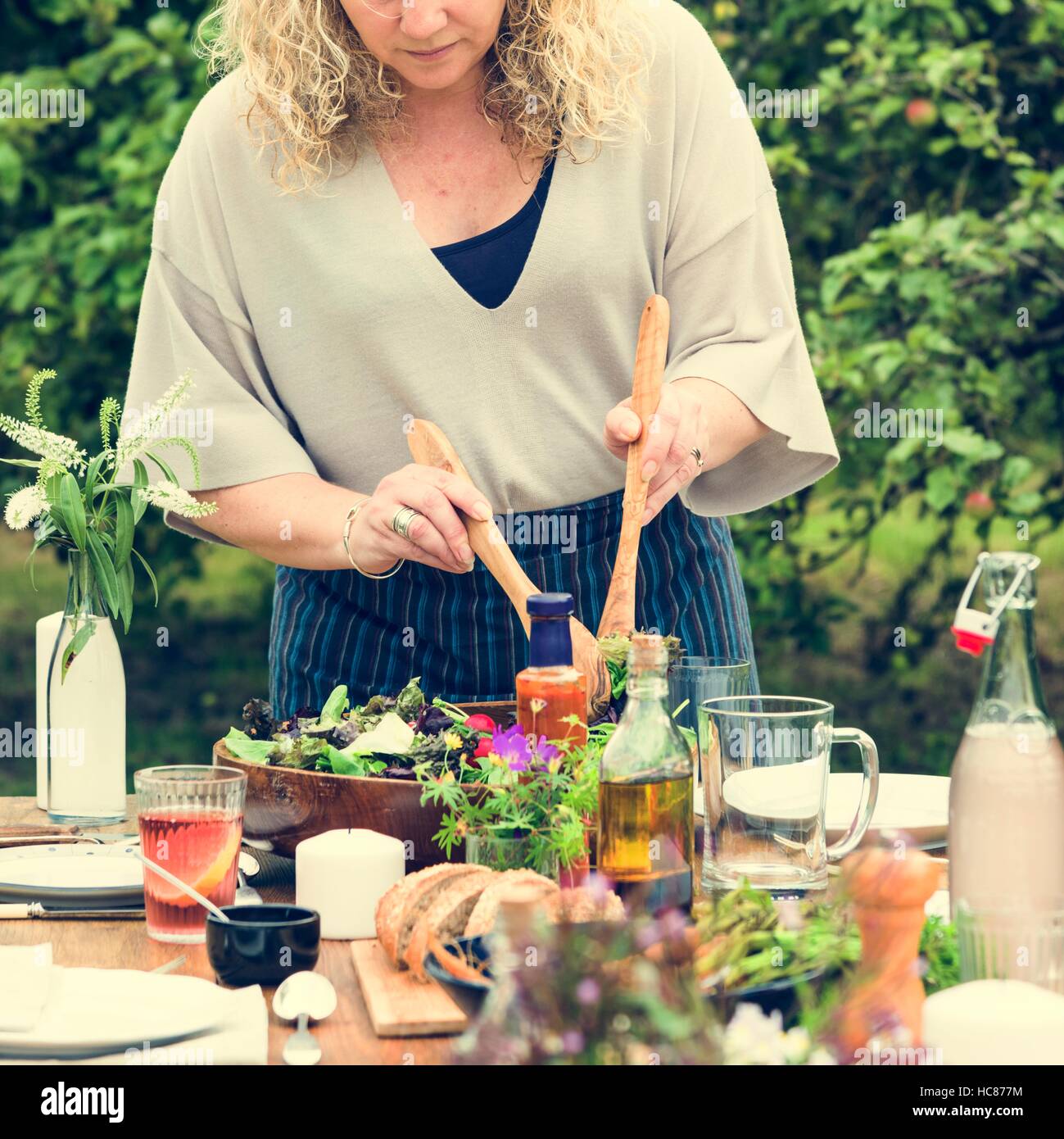 Woman Preparing Table Dinner Concept Stock Photo - Alamy