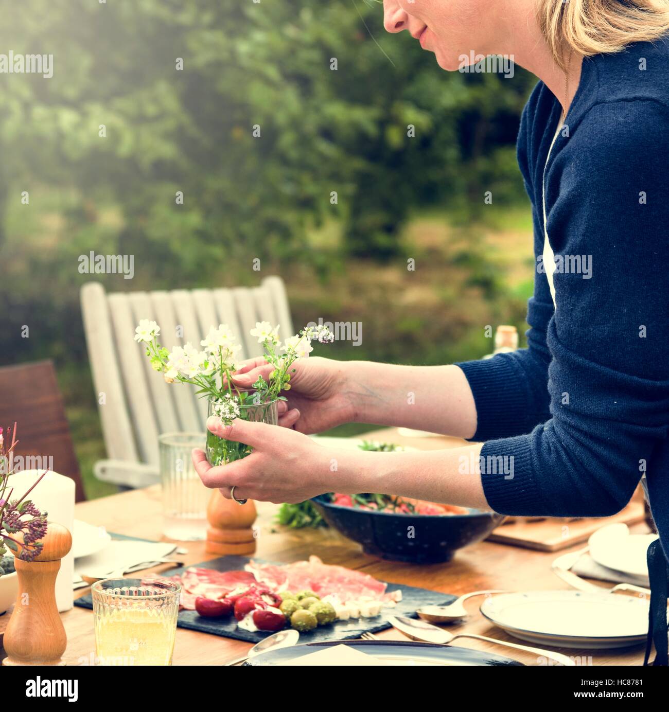 Woman Preparing Table Dinner Concept Stock Photo - Alamy