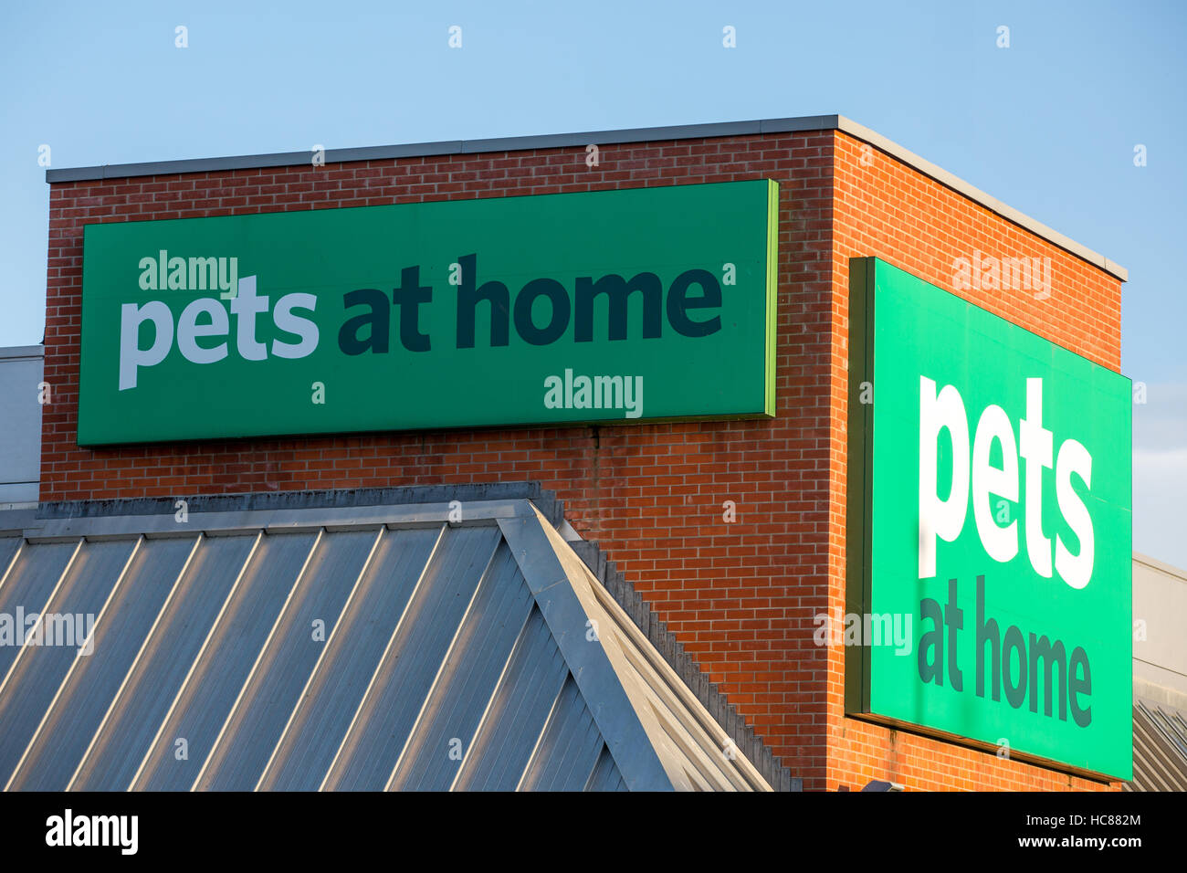 Pets at home sign, above the Aberystwyth branch Stock Photo - Alamy