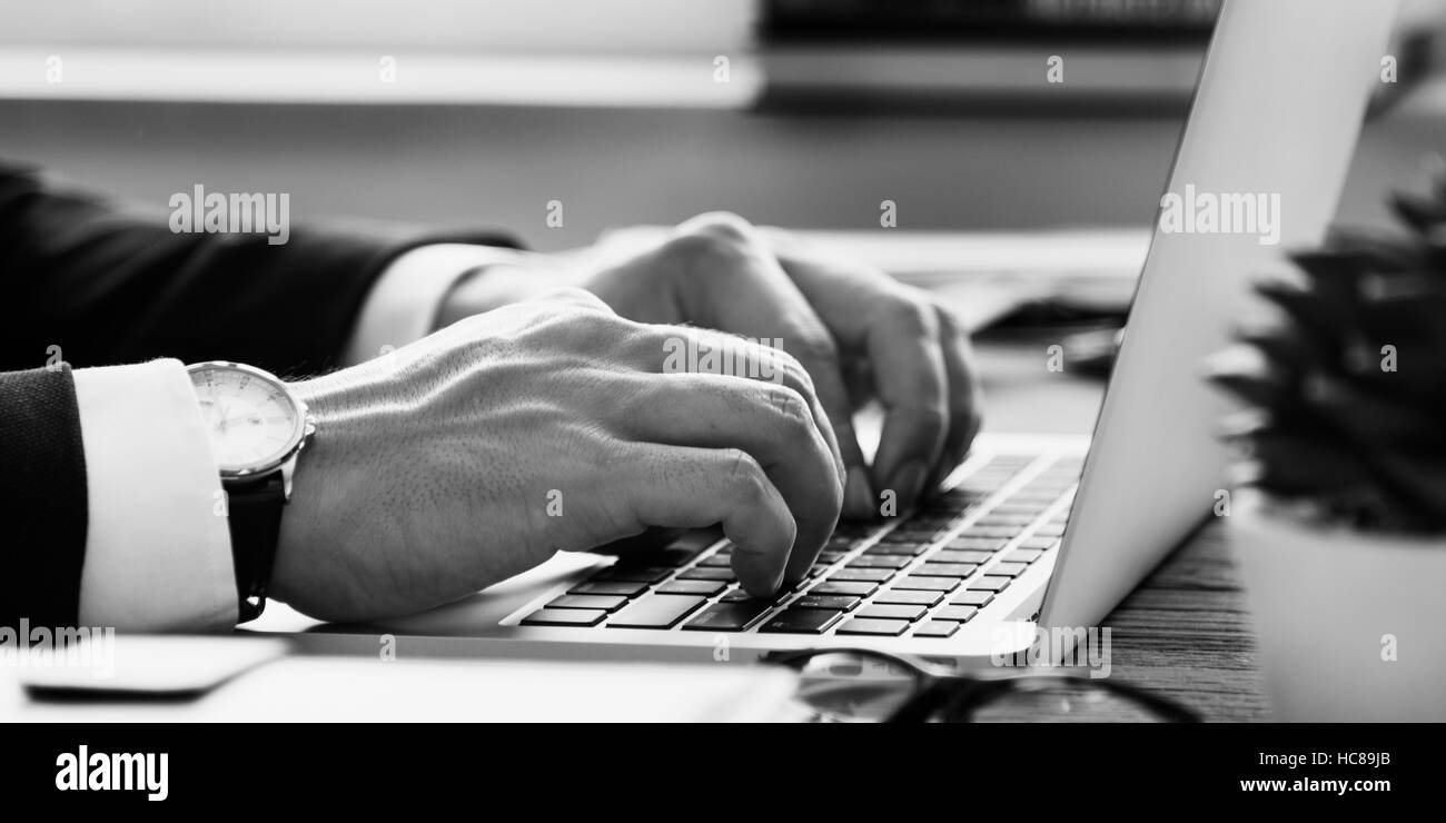 Hands typing laptop Black and White Stock Photos & Images - Alamy