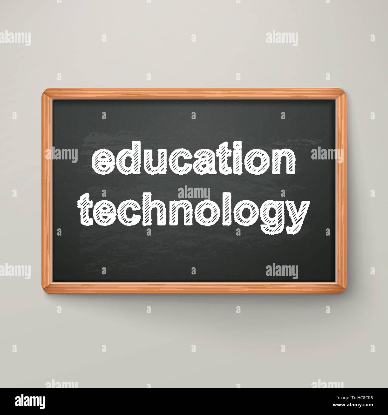education technology on blackboard in wooden frame isolated over grey ...