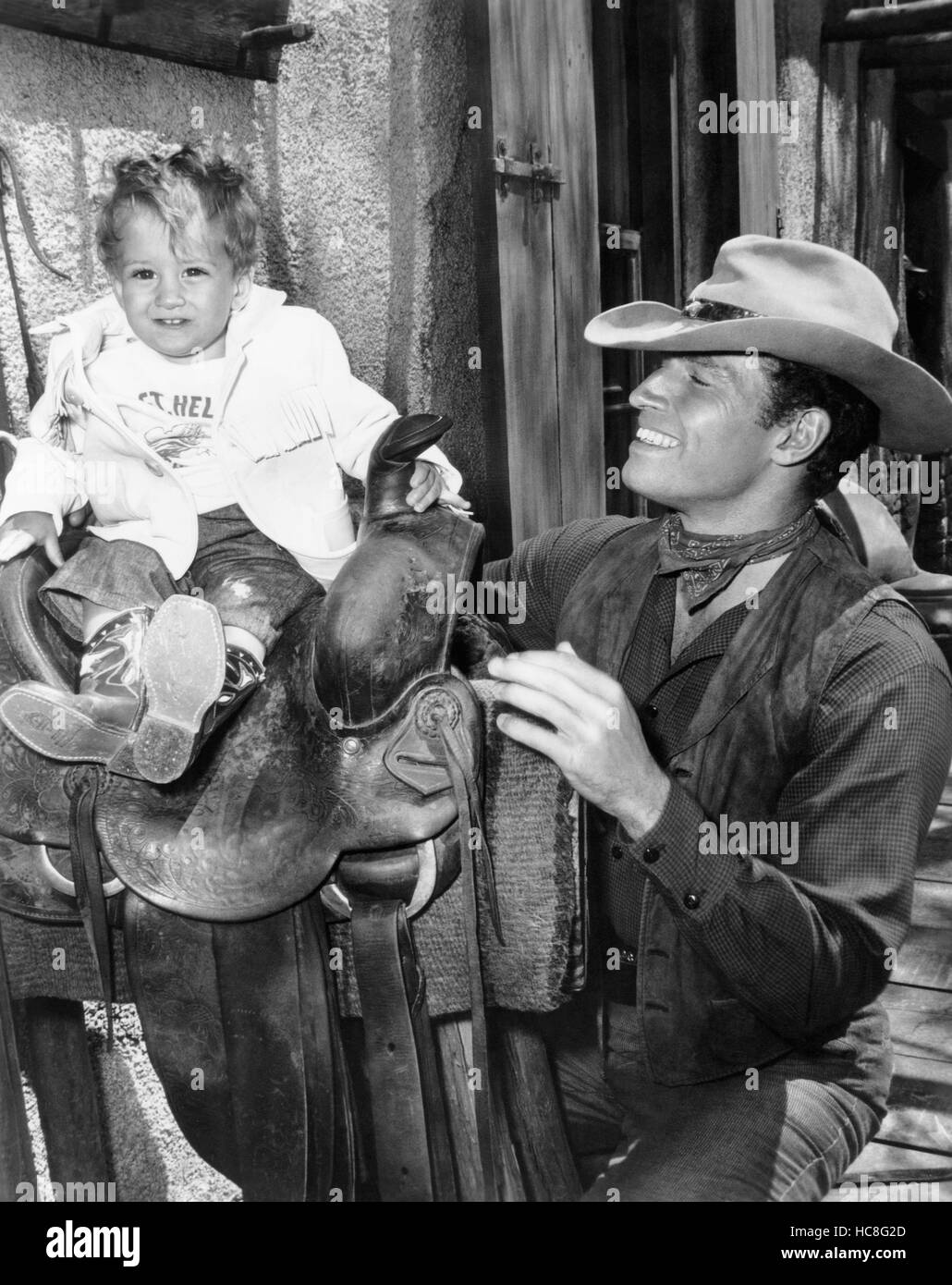 THREE VIOLENT PEOPLE, Charlton Heston with his two year old son Fraser ...