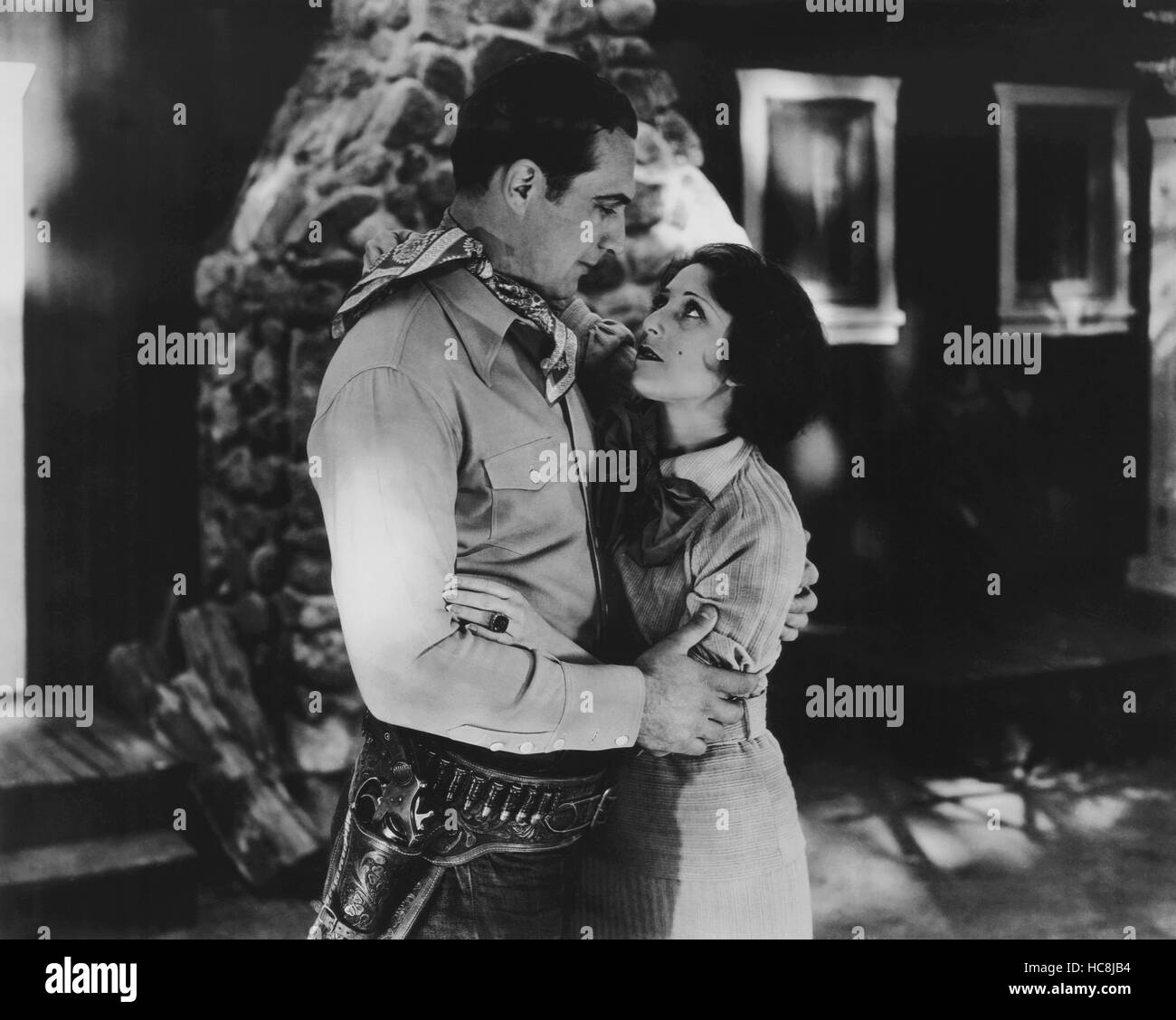 TRACY RIDES, from left: Tom Tyler, Virginia Brown Faire, 1935 Stock Photo - Alamy