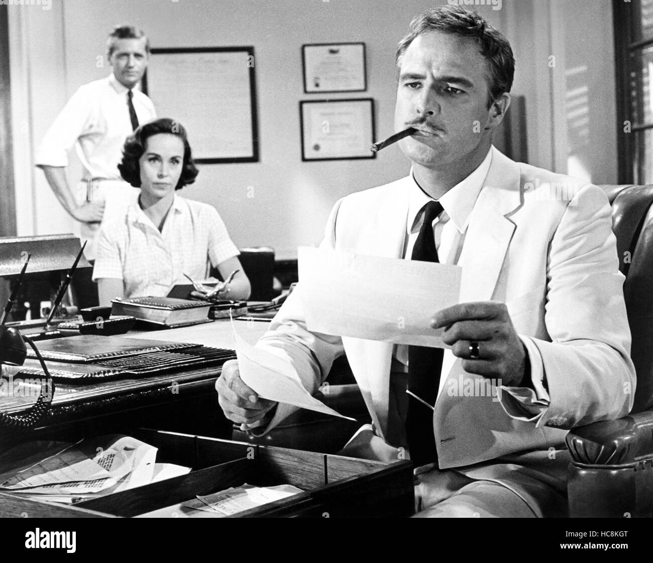 THE UGLY AMERICAN, from back: Arthur Hill, Frances Helm, Marlon Brando ...