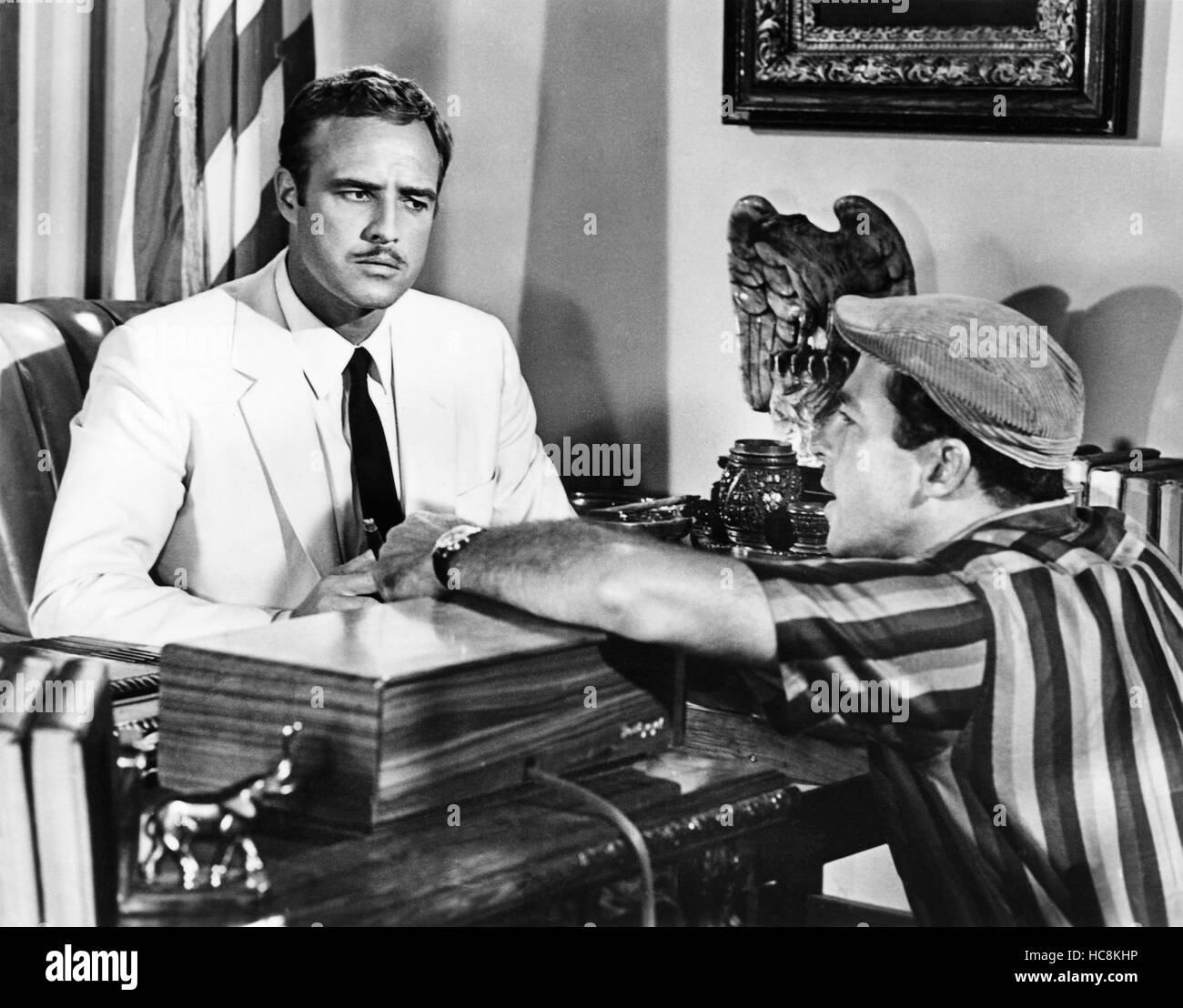 THE UGLY AMERICAN, from left: Marlon Brando, producer-director George ...