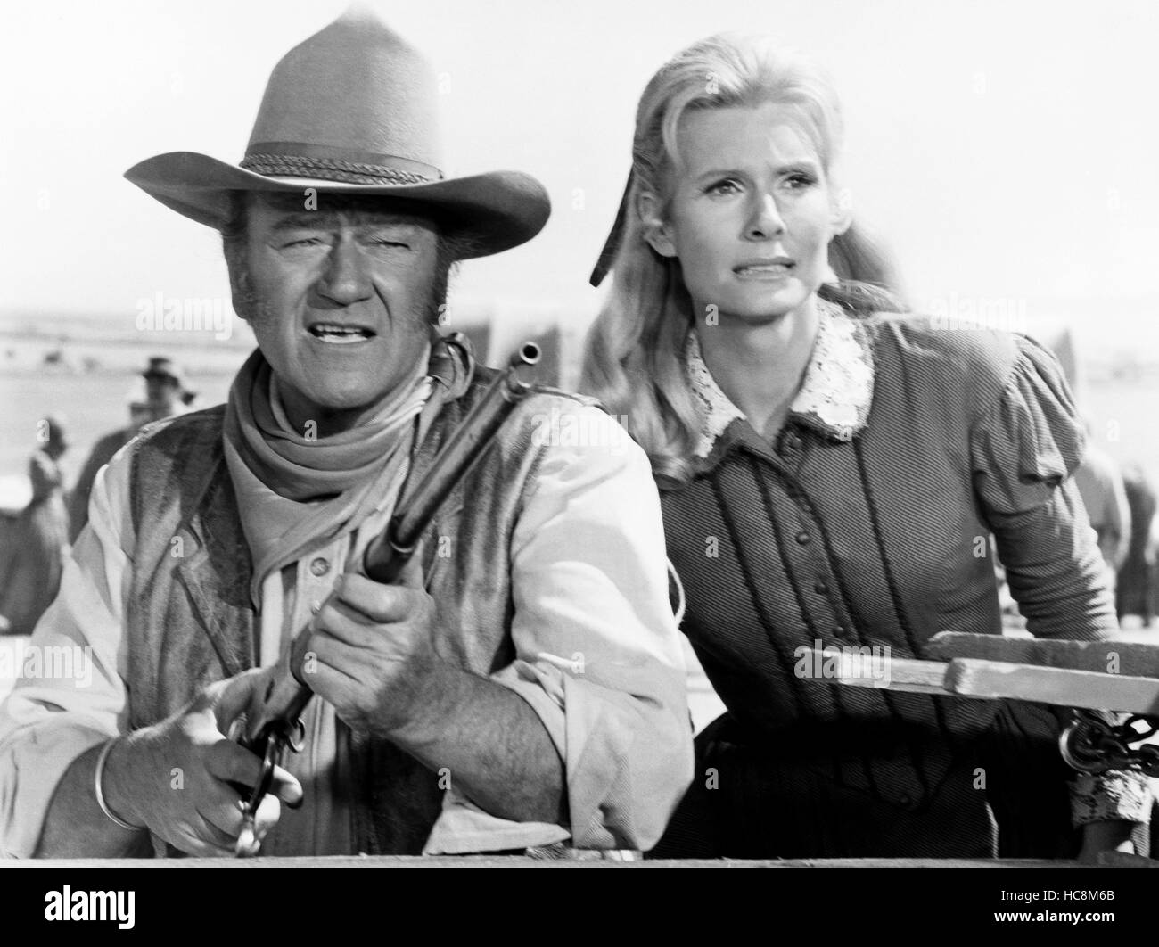 THE UNDEFEATED, from left, John Wayne, Marian McCargo, 1969, TM and ...