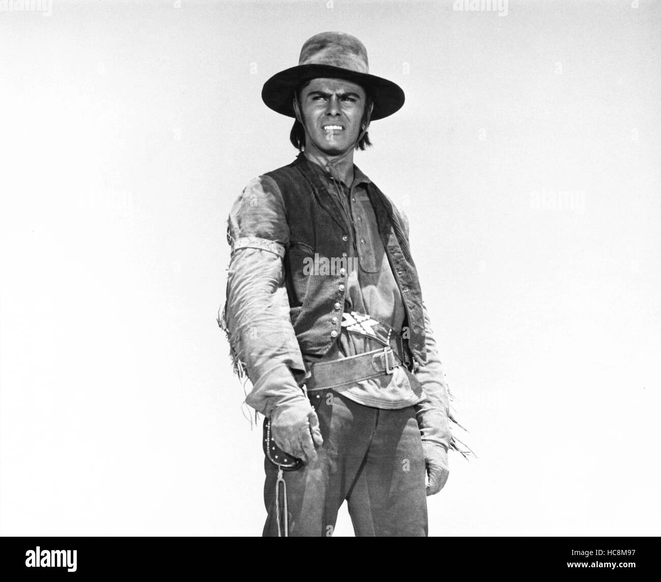 THE UNFORGIVEN, John Saxon, 1960 Stock Photo - Alamy
