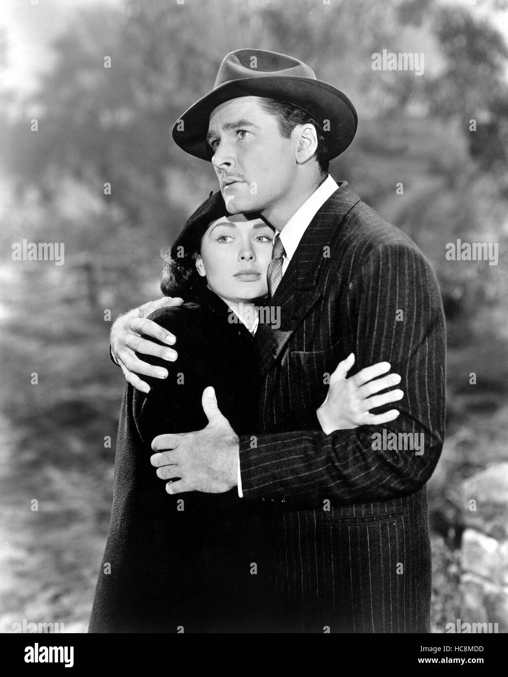 UNCERTAIN GLORY, Jean Sullivan, Errol Flynn, 1944 Stock Photo - Alamy