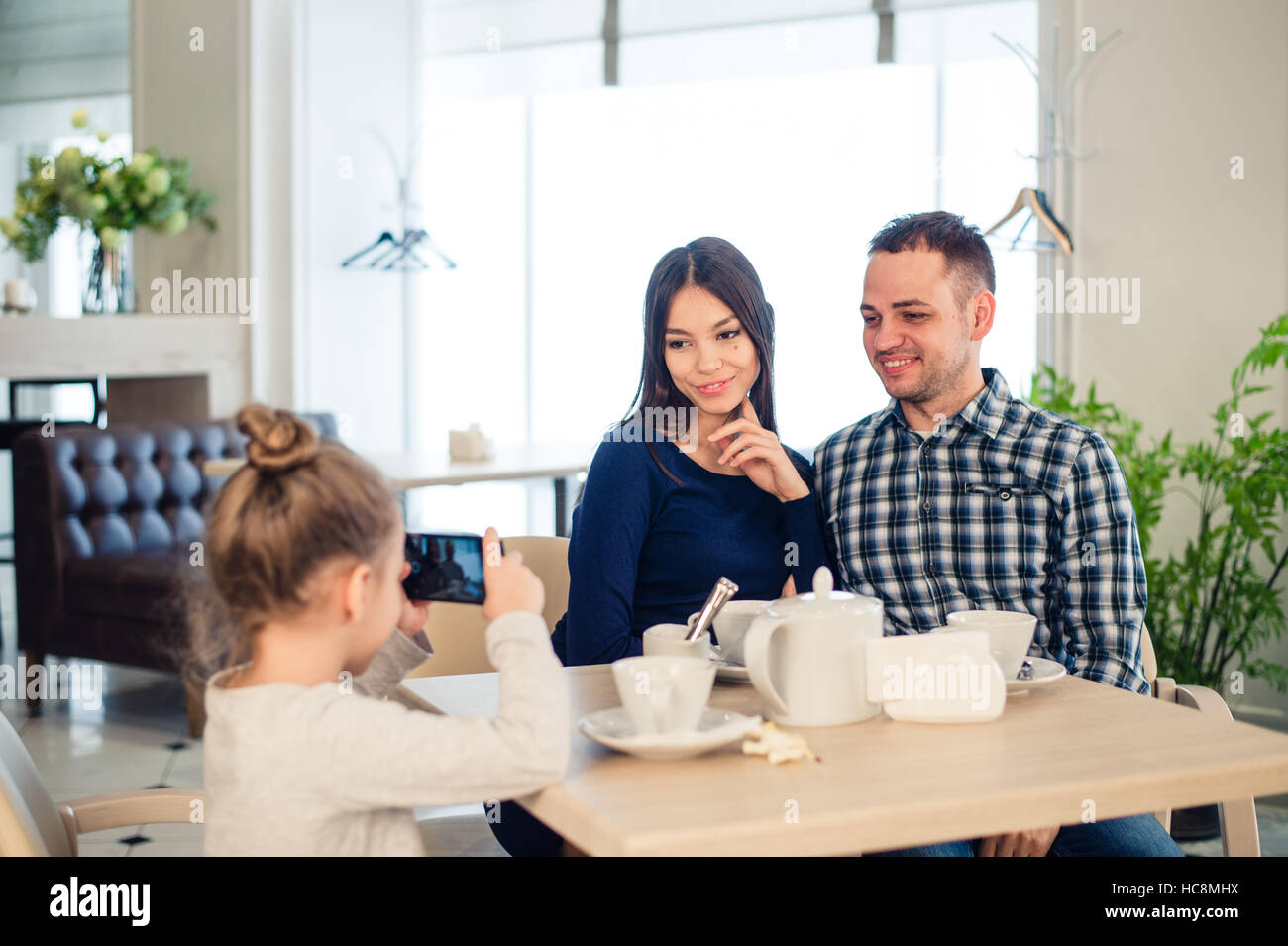 family, parenthood, technology people concept - close up of happy ...