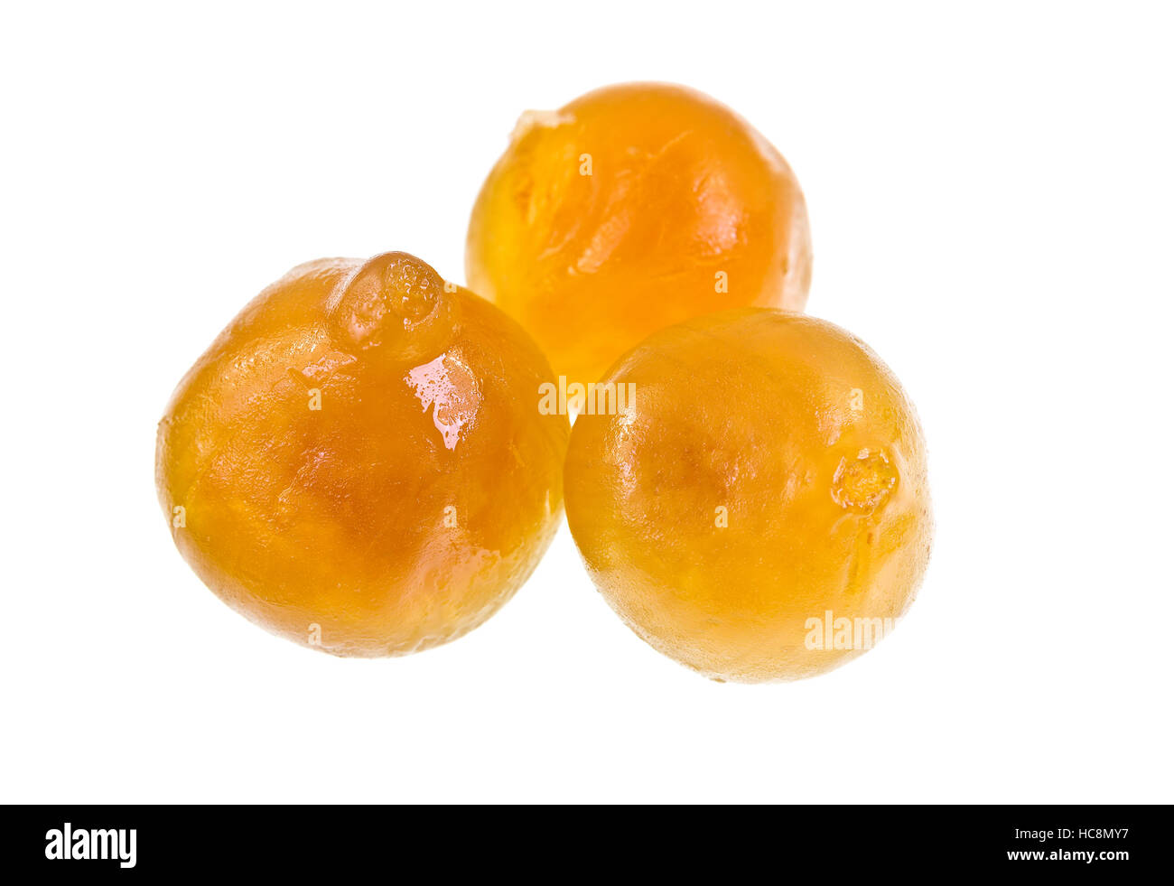 Sweet whole candied figs isolated on a white background. Figs grow on ...