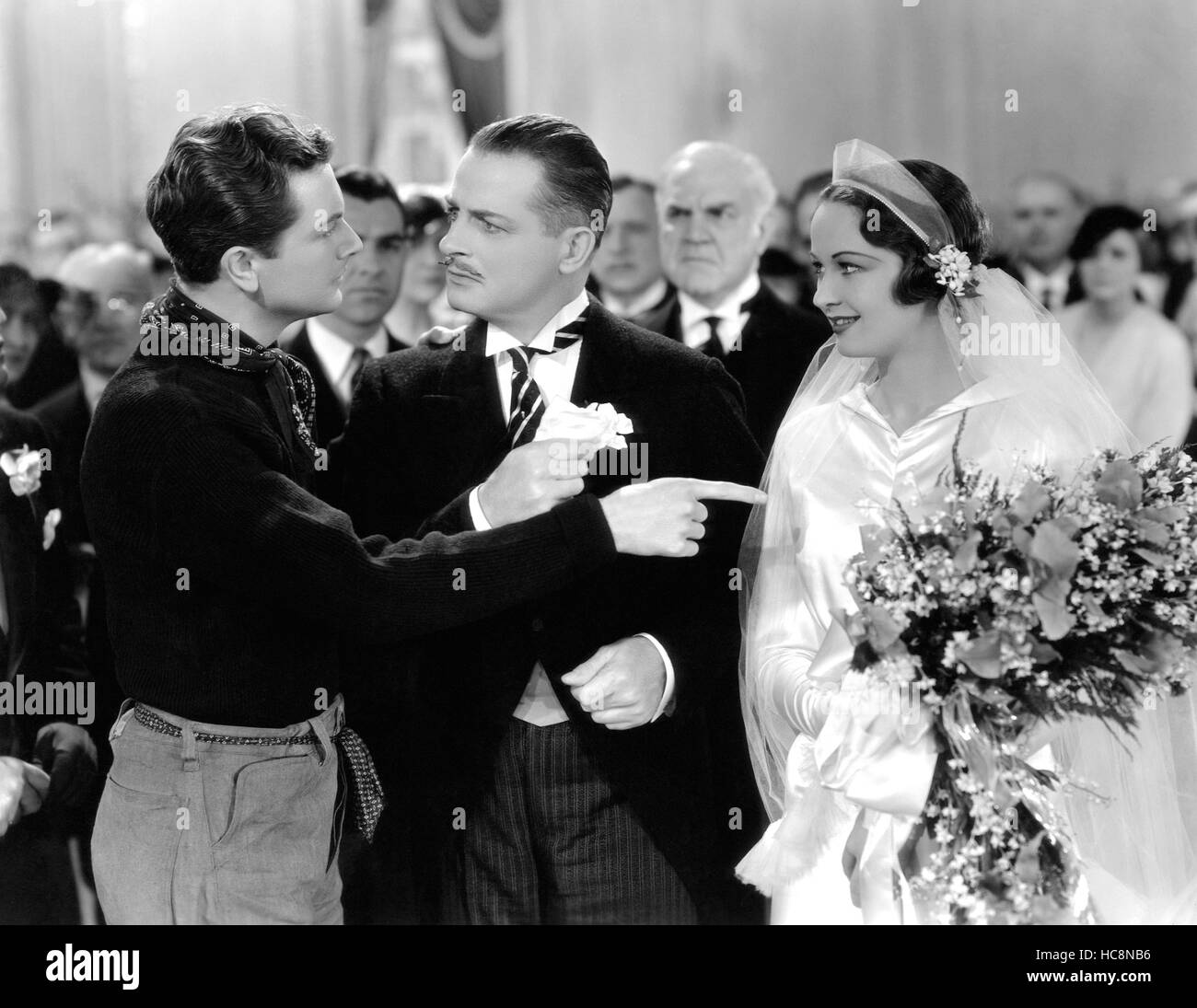 VAGABOND LADY, from left, Robert Young, Reginald Denny, Evelyn Venable ...