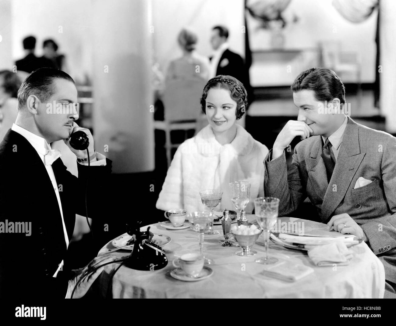 VAGABOND LADY, from left: Reginald Denny, Evelyn Venable, Robert Young ...