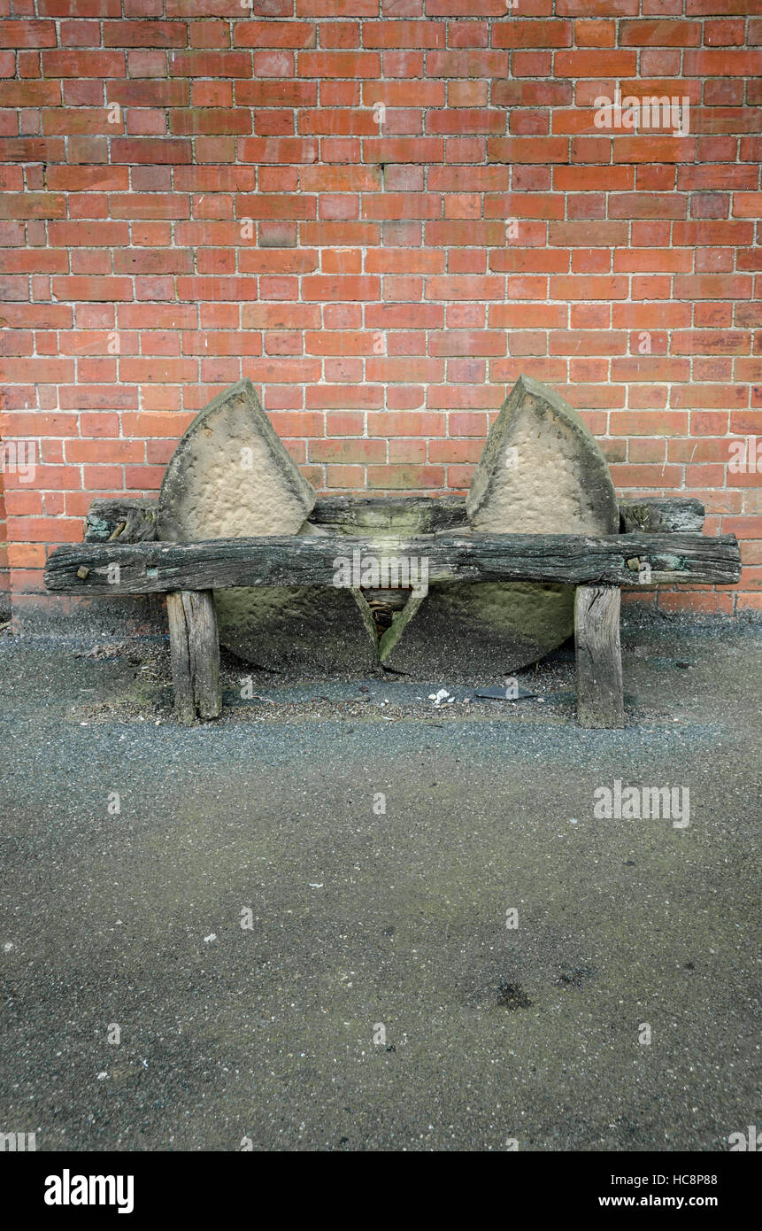 Two halves of a millstone from a windmill Stock Photo - Alamy