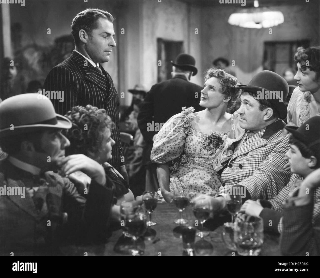 WE'RE GOING TO BE RICH, from left: Brian Donlevy (standing), Coral ...
