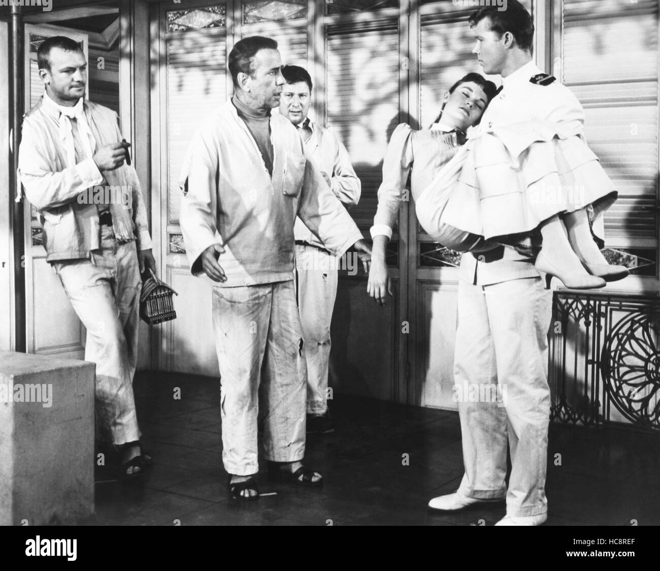 WE'RE NO ANGELS, from left: Aldo Ray, Humphrey Bogart, Peter Ustinov ...