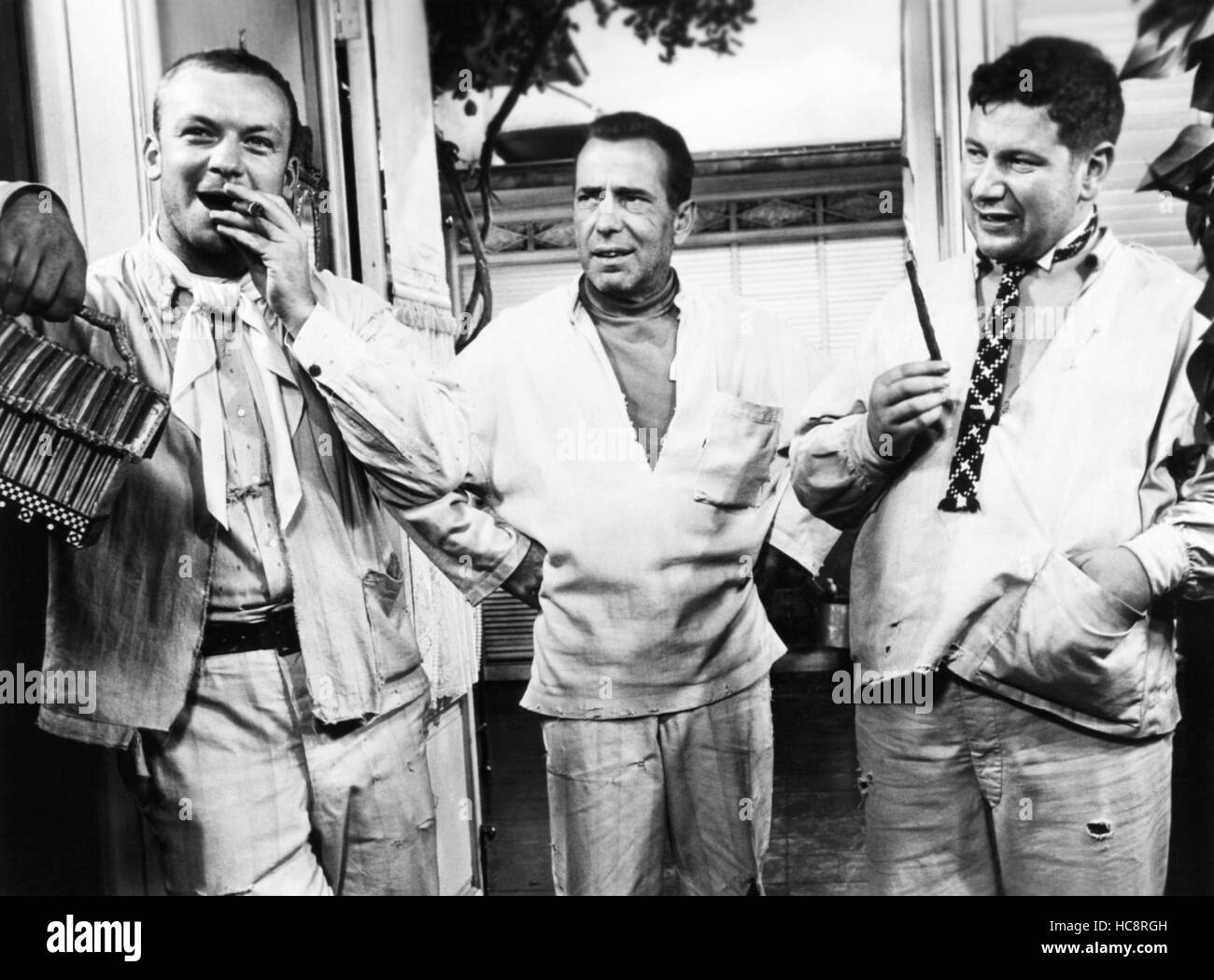 WE'RE NO ANGELS, from left: Aldo Ray, Humphrey Bogart, Peter Ustinov ...