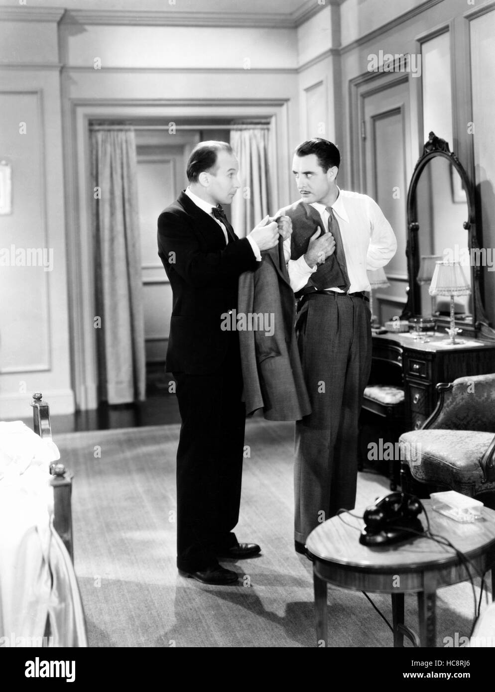 WEST OF BROADWAY, from left, El Brendel, John Gilbert, 1931 Stock Photo ...