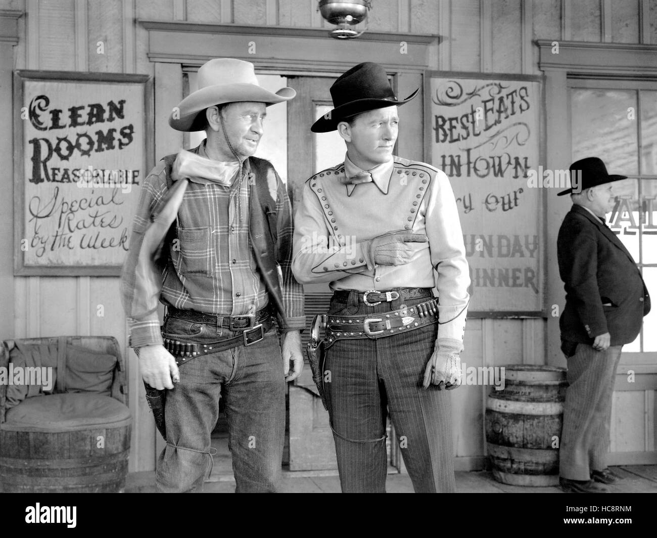 WEST OF THE ALAMO, from left, Lee 'Lasses' White, Jimmy Wakely, 1946 ...