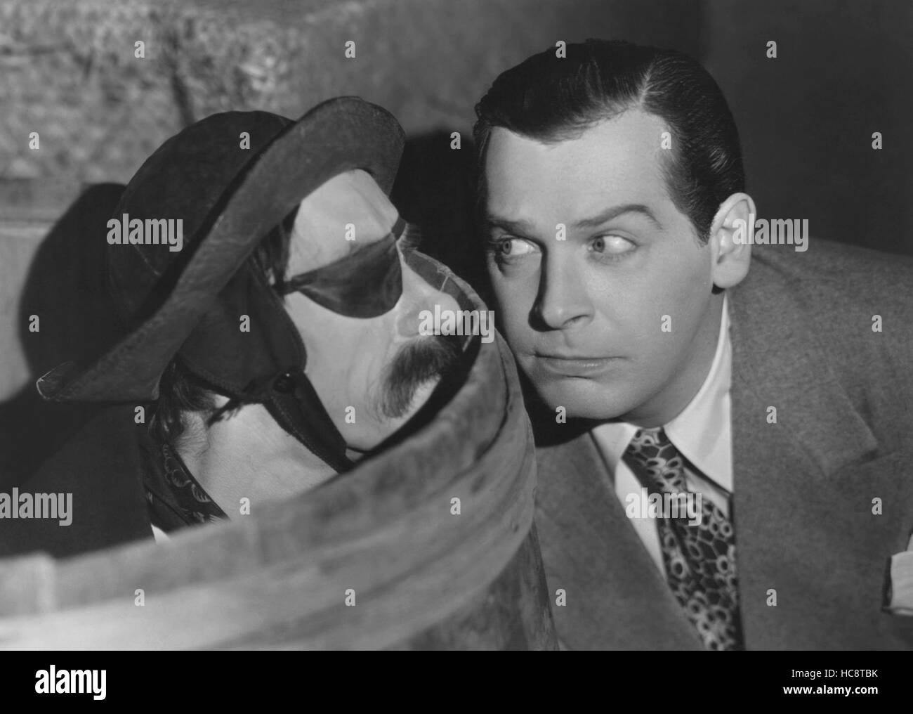 WHISPERING GHOSTS, from left: John Carradine, Milton Berle, 1942, TM & Copyright © 20th Century ...