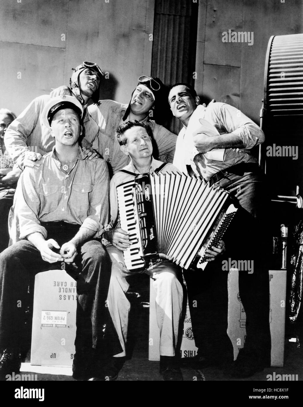 THE WINGS OF EAGLES, seated front from left: Dan Dailey, set ...