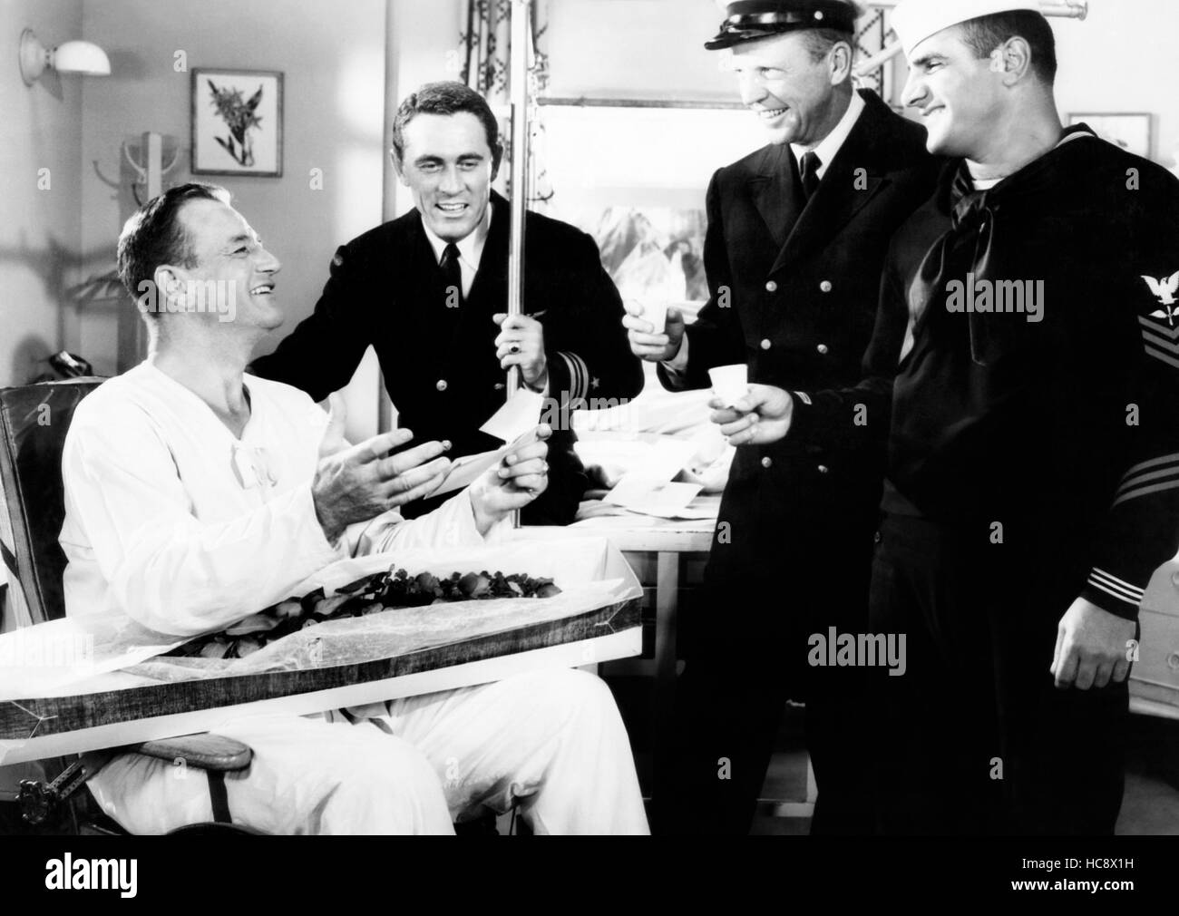 THE WINGS OF EAGLES, from left: John Wayne, Ken Curtis, Dan Dailey ...
