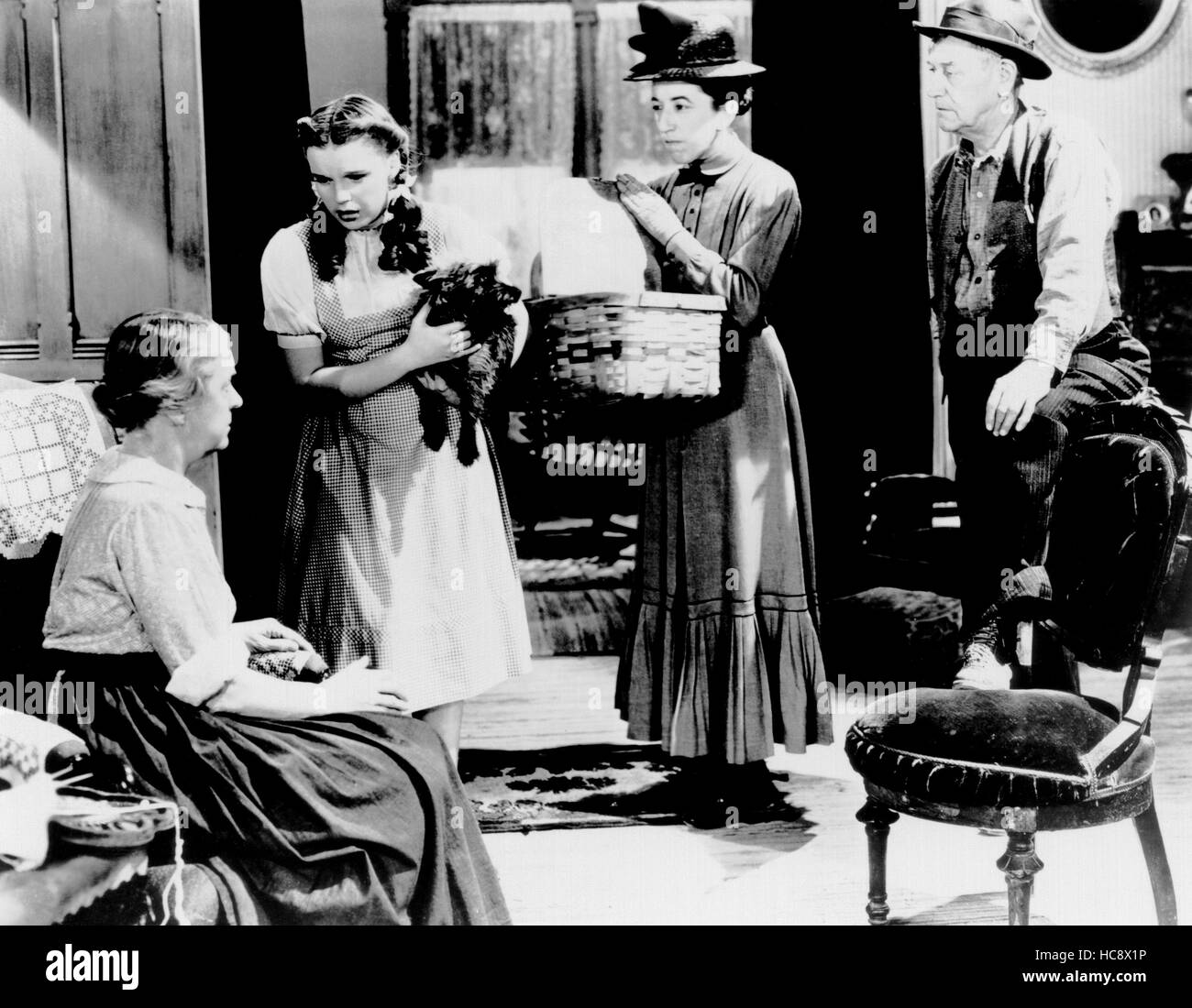 THE WIZARD OF OZ, from left, Clara Blandick, Judy Garland, (holding ...