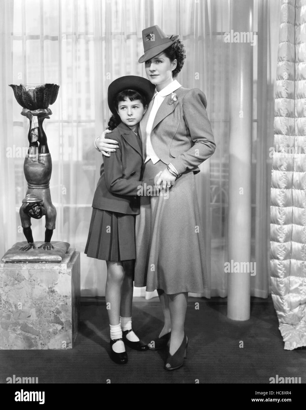 THE WOMEN, from left, Virginia Weidler, Norma Shearer, (in a suit by ...