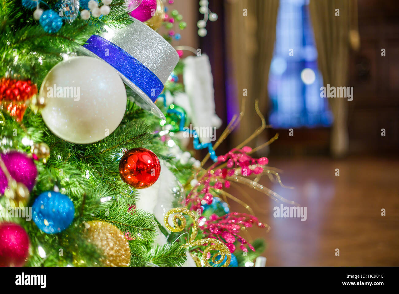 Closeup of decorated Christmas tree at hall Stock Photo - Alamy