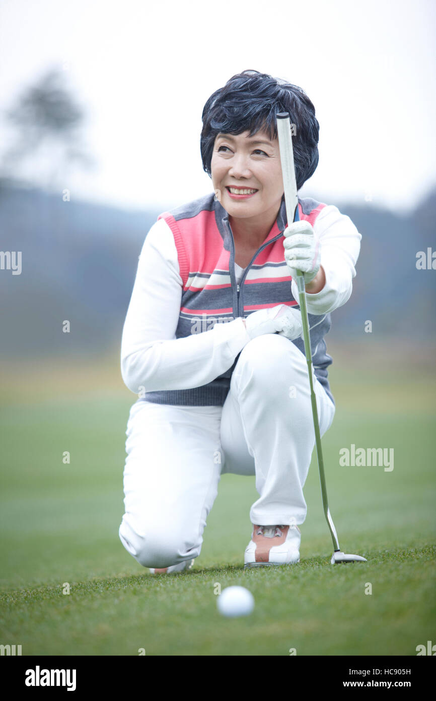 Female golfer sitting in golf hi-res stock photography and images - Alamy