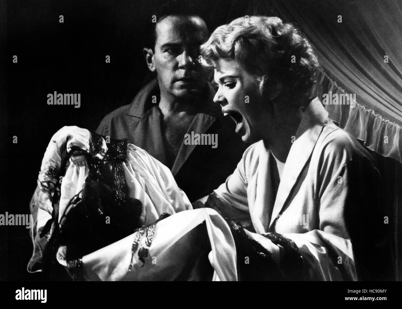 TORMENTED, l-r: Richard Carlson, Lugene Sanders, 1960 Stock Photo - Alamy