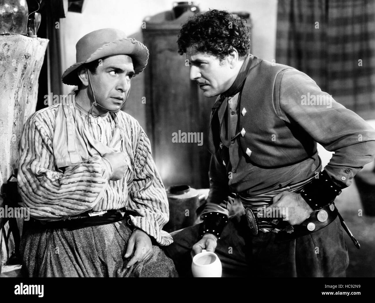 UNER THE PAMPAS MOON, from left: J. Carrol Naish, Warner Baxter, 1935 ...