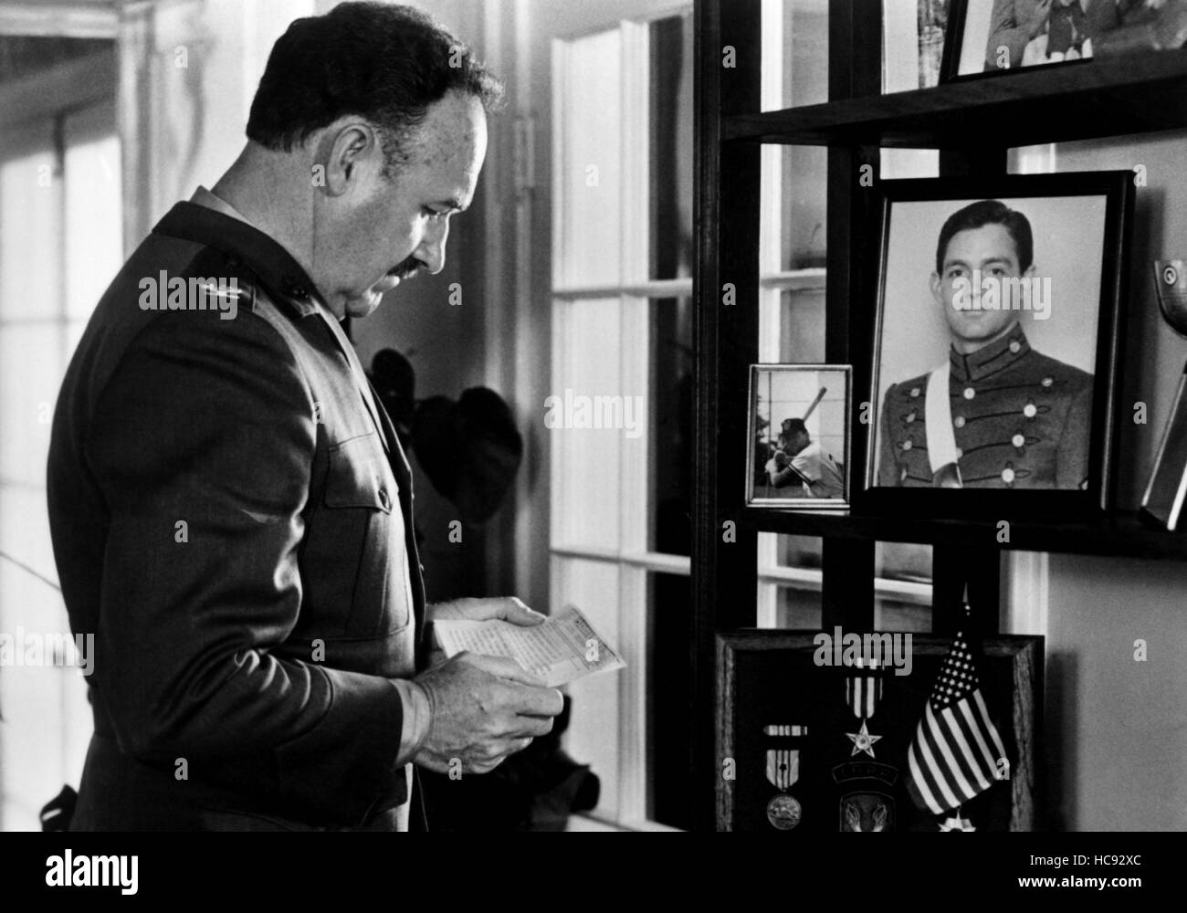 UNCOMMON VALOUR, Gene Hackman, Todd Allen (in photograph), 1983, (c ...