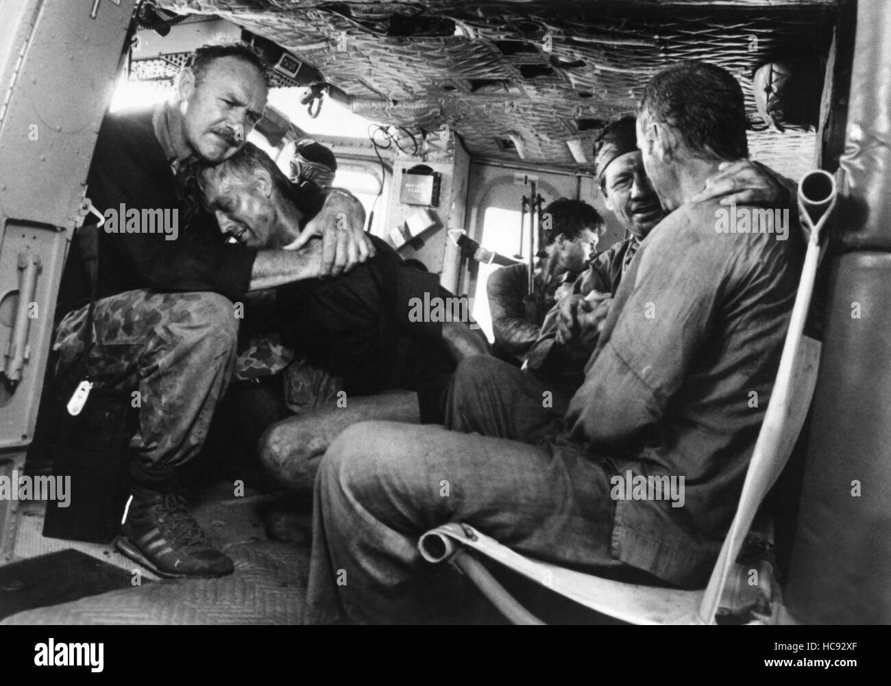 UNCOMMON VALOUR, (l-r): Gene Hackman, Kelly Yunkerman, Patrick Swayze ...