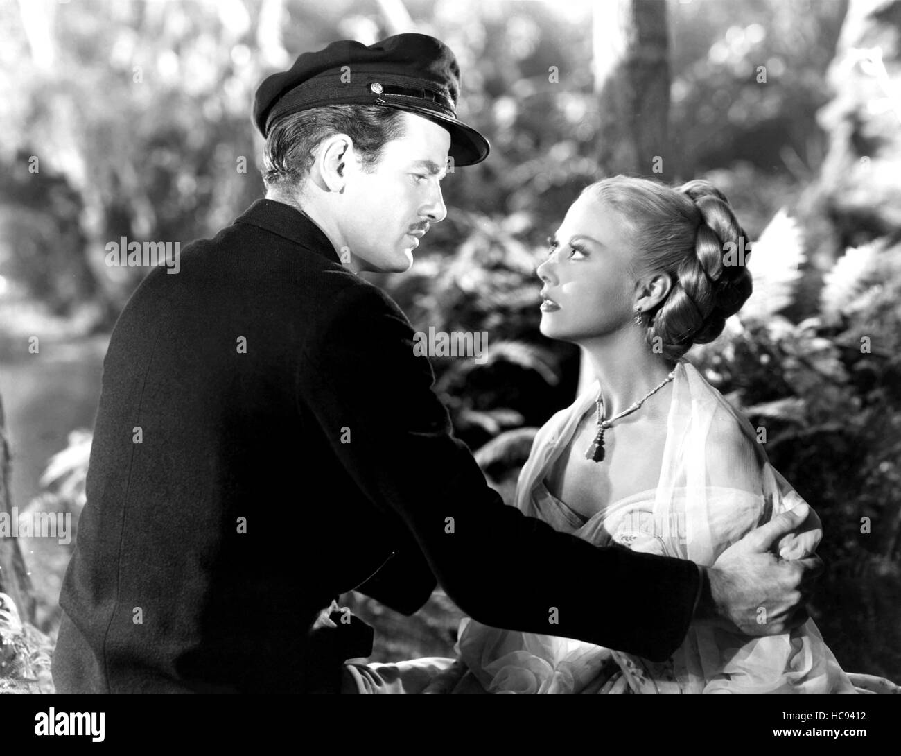 WAKE OF THE RED WITCH, from left, Gig Young, Adele Mara, 1948 Stock ...