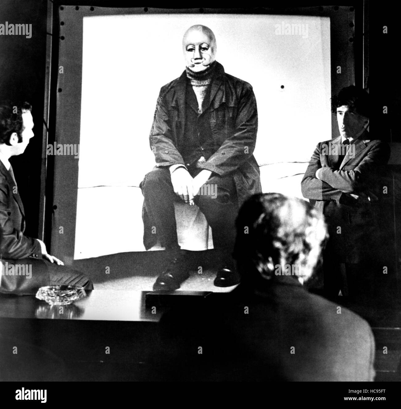 WHO?, Joe Bova (seated), Elliott Gould (right), 1973 Stock Photo - Alamy