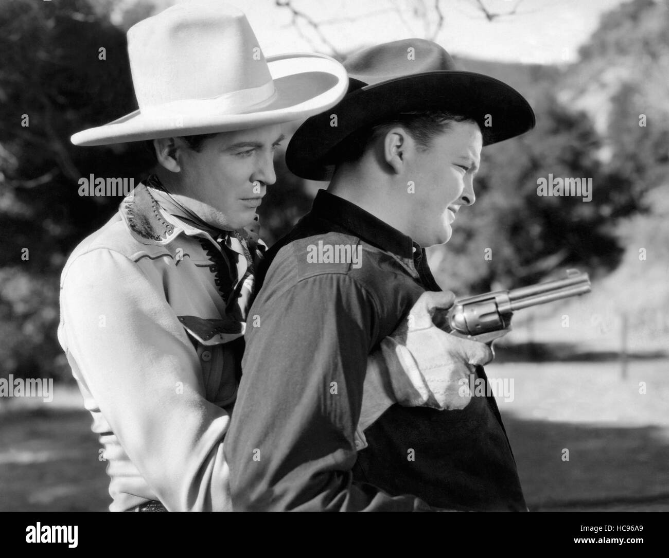 WHERE THE WEST BEGINS, from left: Jack Randall, Ralph Peters, 1938 ...