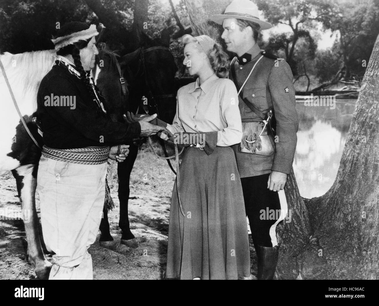 WHERE THE NORTH BEGINS, from left: Artie Ortego, Jennifer Holt, Russell Hayden, 1947 Stock Photo ...