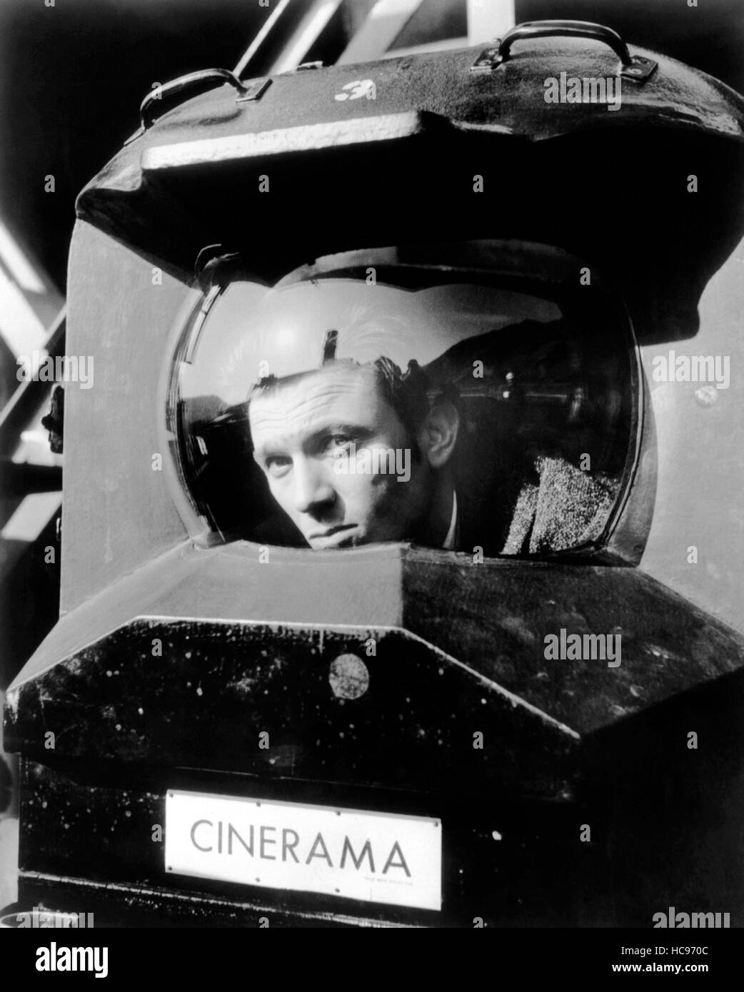 THE WONDERFUL WORLD OF THE BROTHERS GRIMM, Laurence Harvey, examining a ...