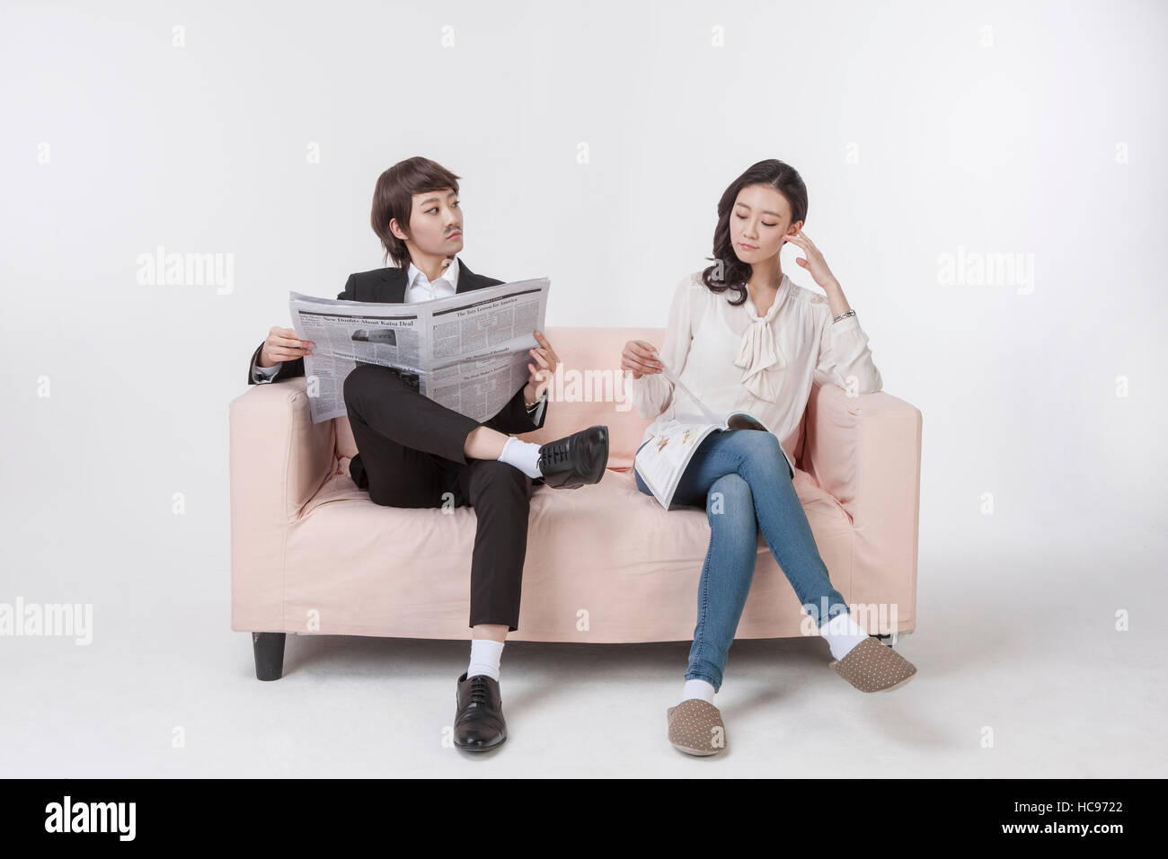 Role reversal of man and woman Stock Photo - Alamy