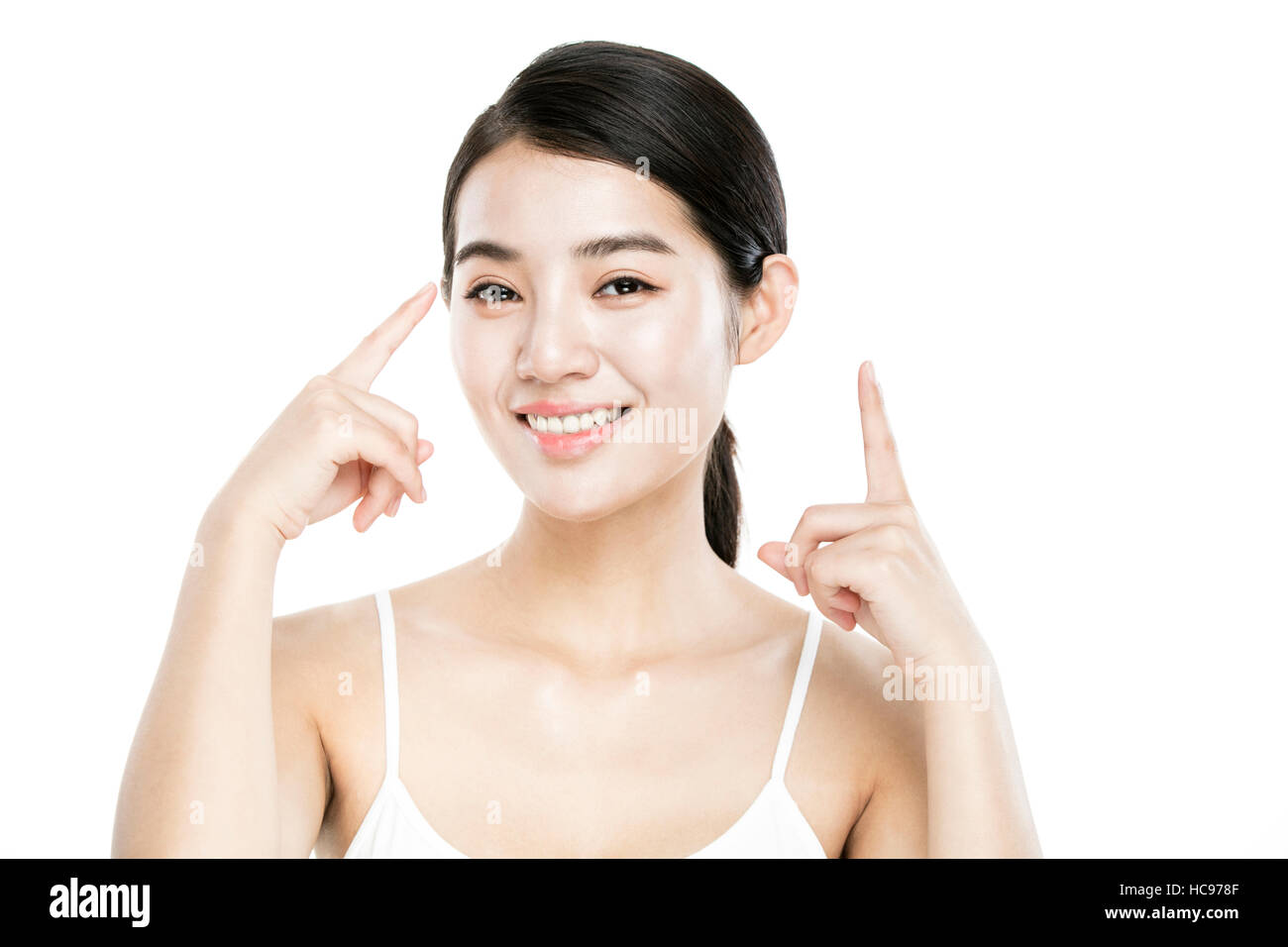 Smiling asian woman pointing camera hi-res stock photography and images ...