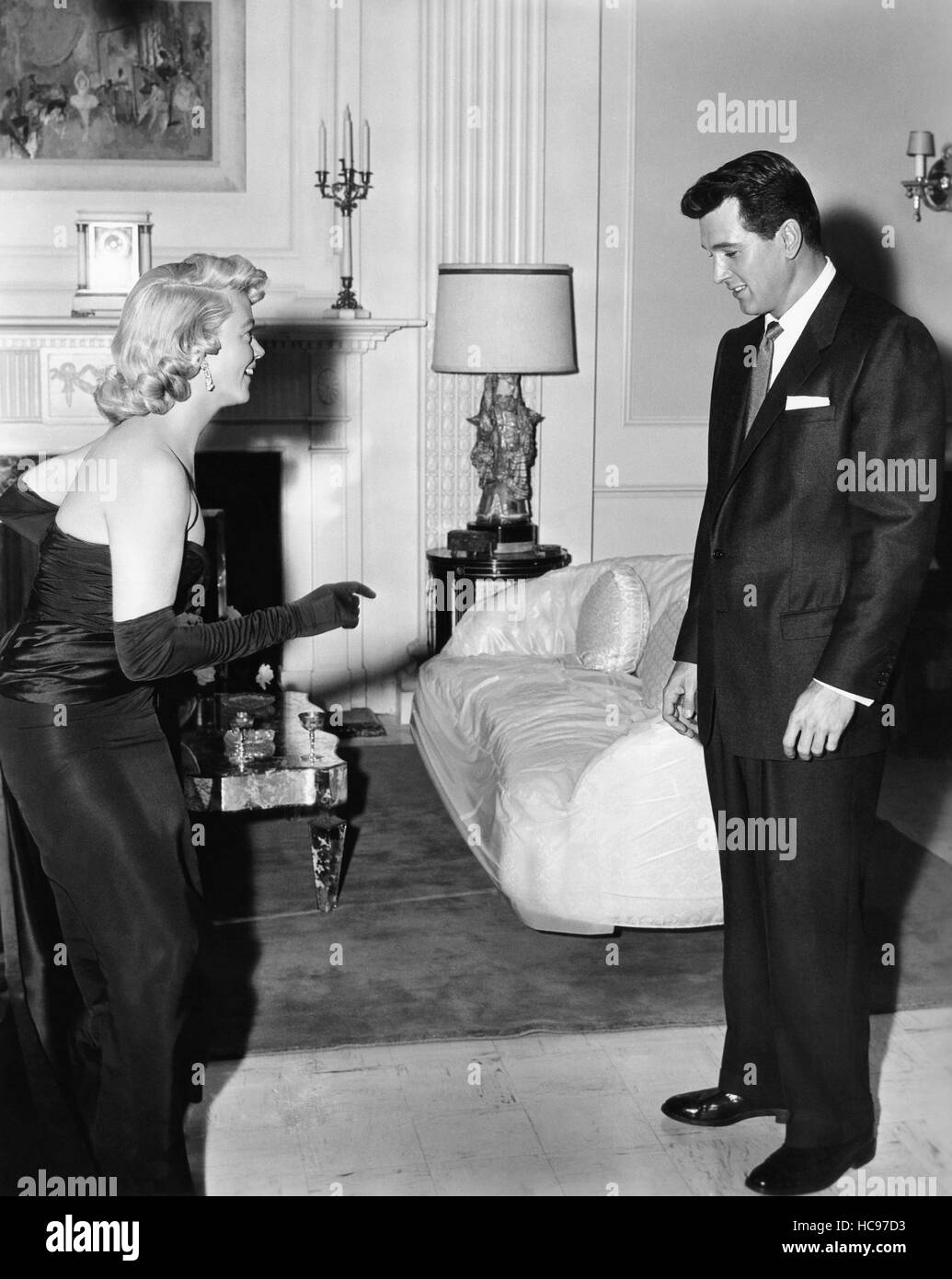 WRITTEN ON THE WIND, Dorothy Malone, left, teaches Rock Hudson a new ...
