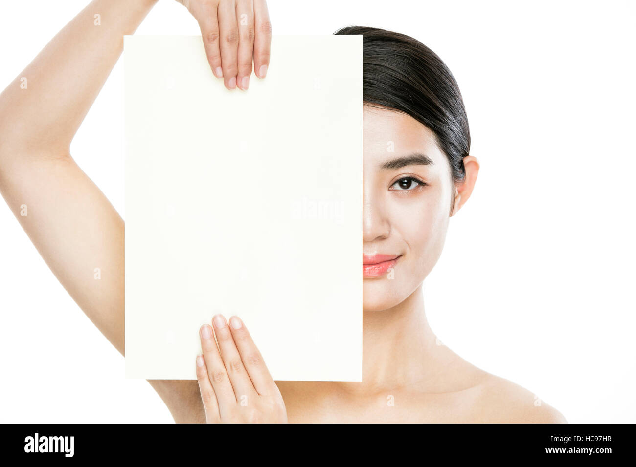 Half of young smiling woman's face Stock Photo - Alamy