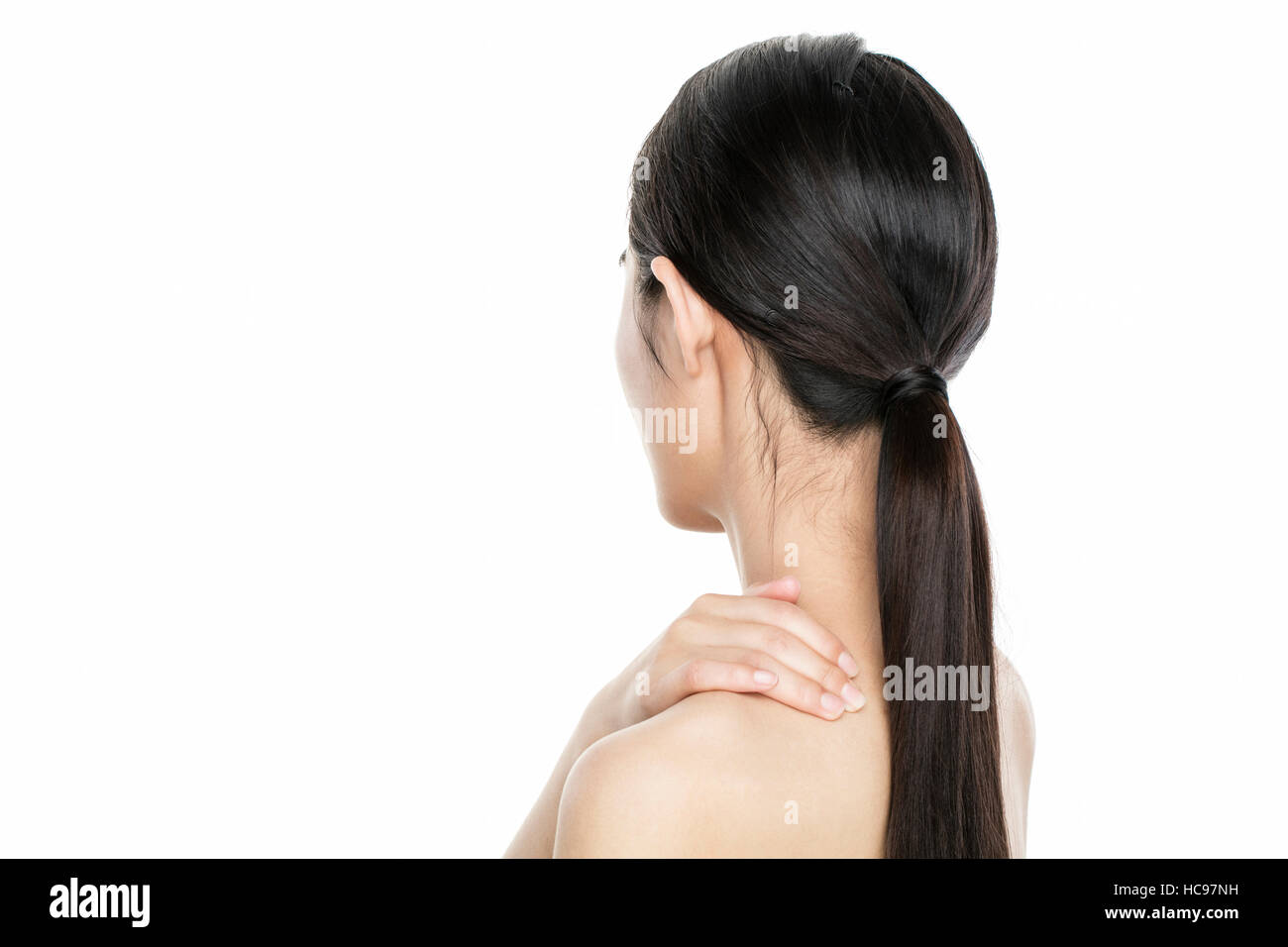 Woman touching shoulder beauty hi-res stock photography and images - Alamy