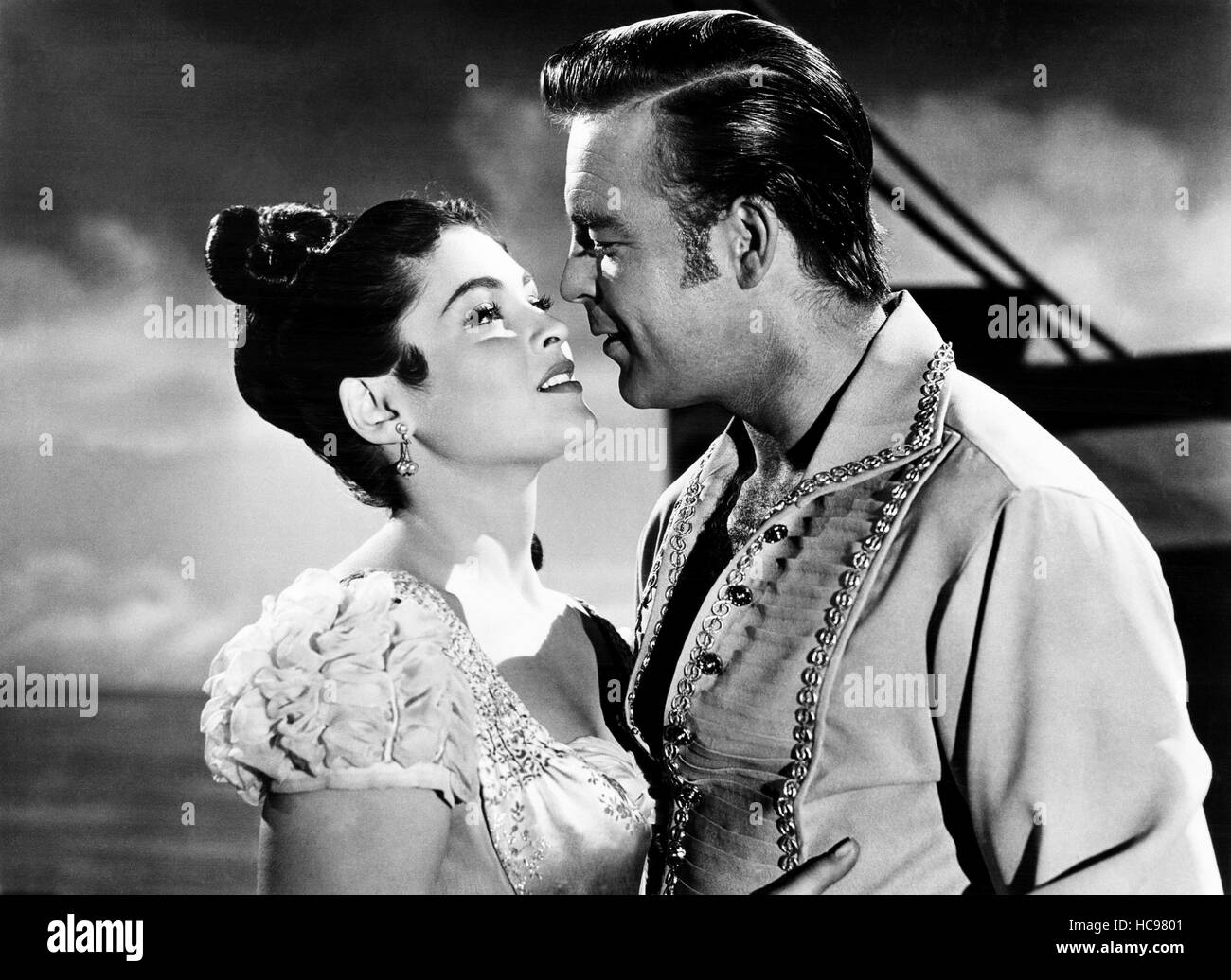 YANKEE BUCCANEER, from left, Suzan Ball, Scott Brady, 1952 Stock Photo ...